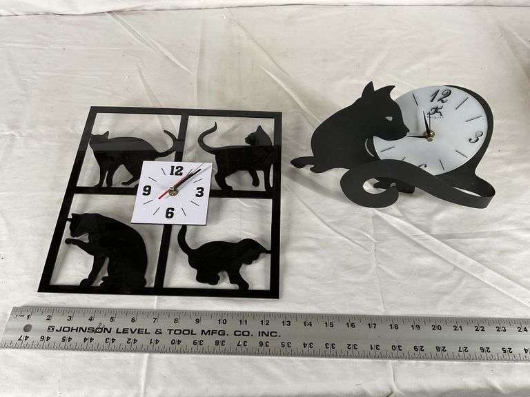Metal cat clocks, work, need batteries - Legacy Auction Company