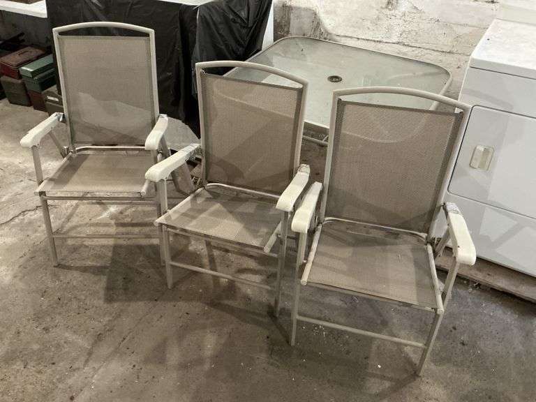 Patio table and three chairs - Legacy Auction Company