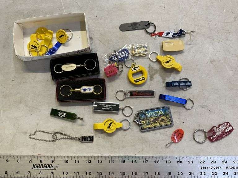 Assorted advertising keychains - Legacy Auction Company