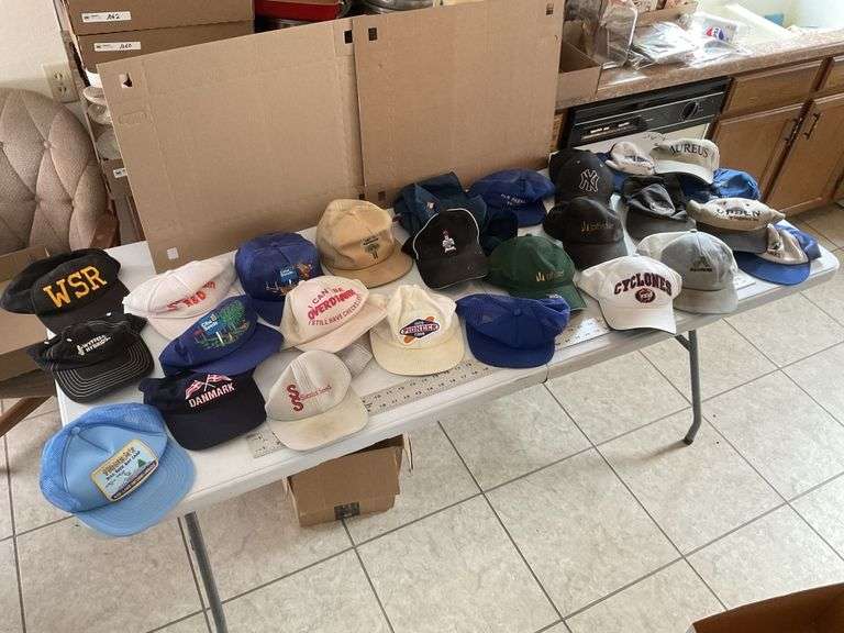 Assorted caps, some need cleaning - Legacy Auction Company