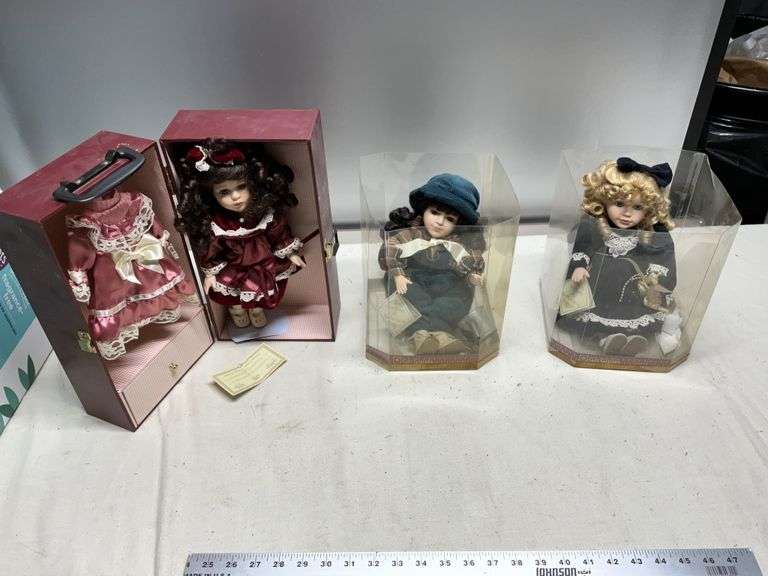 (2) animated porcelain windup music dolls and - Legacy Auction Company