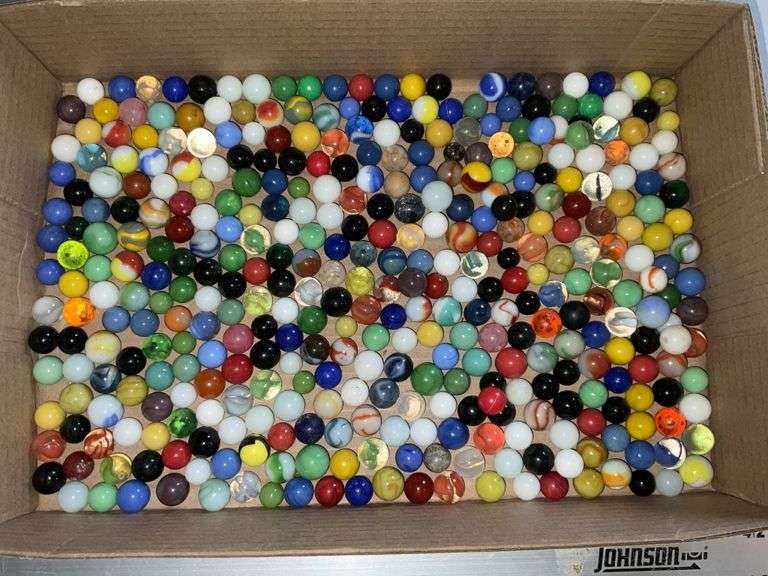 1- box of marbles - Legacy Auction Company