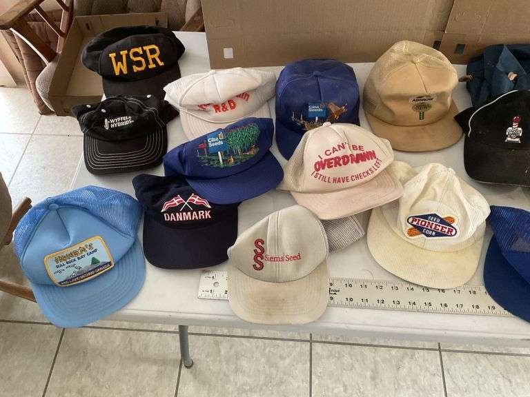 Assorted caps, some need cleaning - Legacy Auction Company
