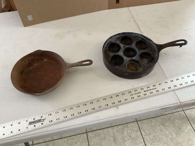 2- cast pans - Legacy Auction Company