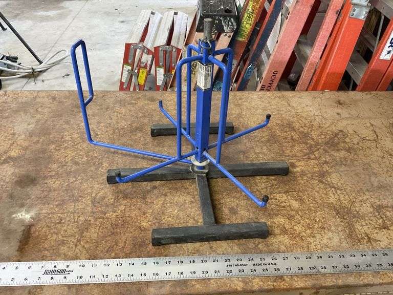 Floor and stud mount cable dispenser - Legacy Auction Company