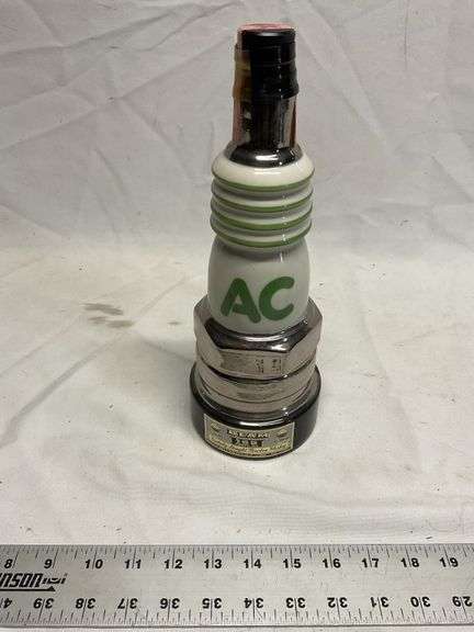 AC spark plug Beam bottle - Legacy Auction Company