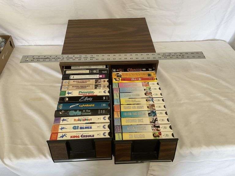 Elvis VHS tapes and organizer - Legacy Auction Company