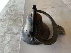 Cast iron dinner bell - Legacy Auction Company
