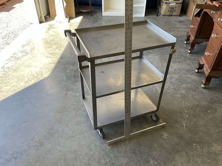 24 x 16 by approximately 31 inches tall, - Legacy Auction Company