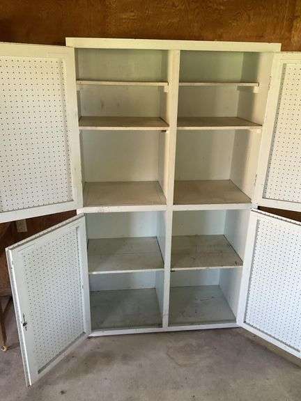 Storage cabinet. Approximately 44 inches wide by - Legacy Auction Company