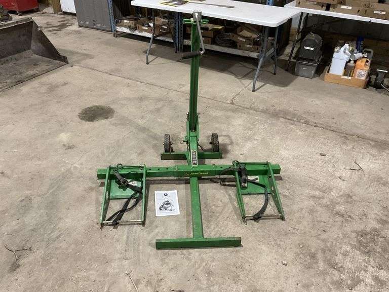 John Deere XD lawn and garden tractor lift - Legacy Auction Company