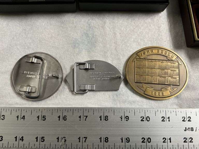 John Deere belt buckles and medallion - Legacy Auction Company