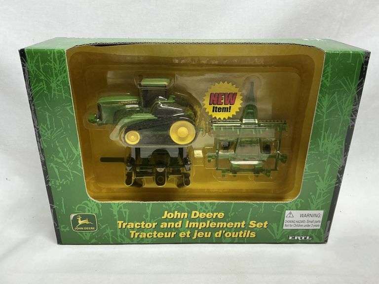 John Deere tractor and implement set - Legacy Auction Company