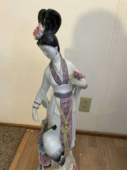 34" porcelain ornate lady - Legacy Auction Company