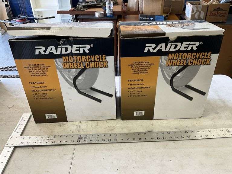 Two raider motorcycle wheel chocks - Legacy Auction Company