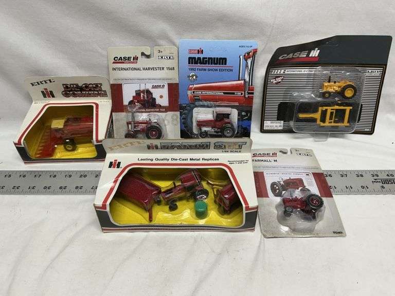 Farm equipment miniature replicas - Legacy Auction Company