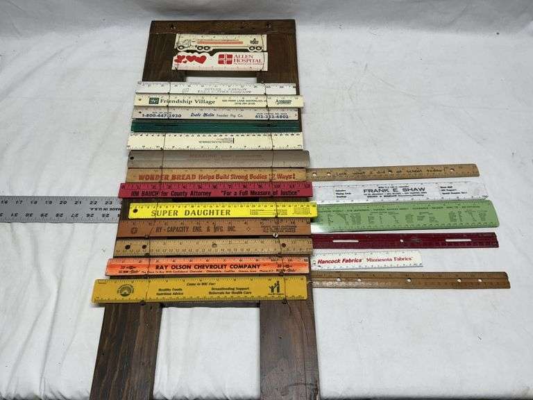 Measuring sticks with display - Legacy Auction Company
