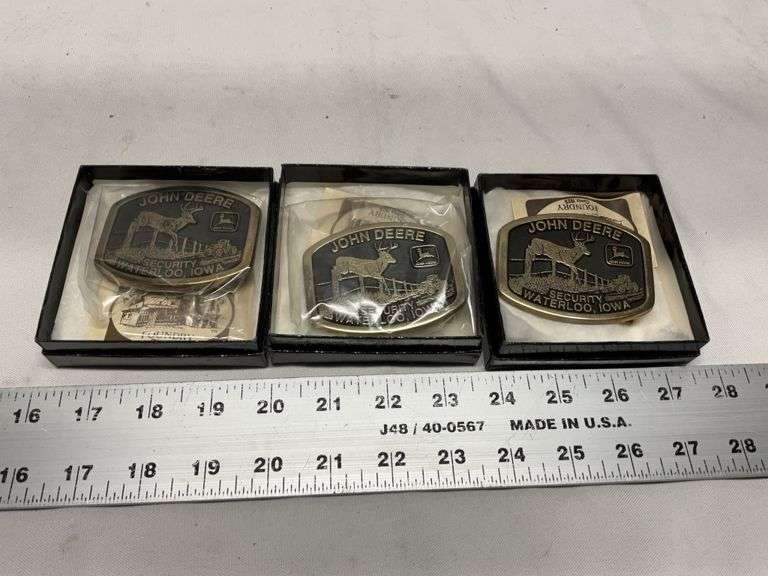 John Deere security belt buckles - Legacy Auction Company