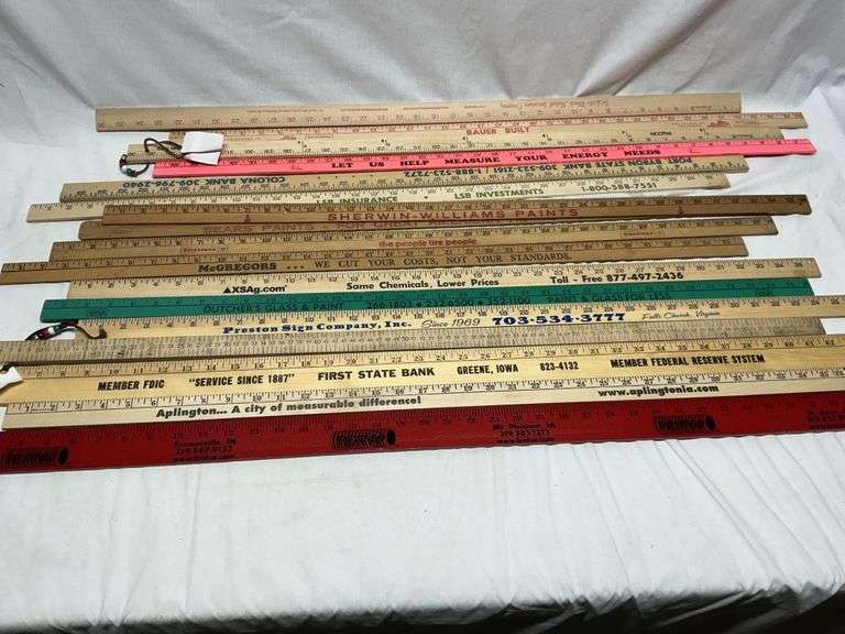 Measuring sticks - Legacy Auction Company