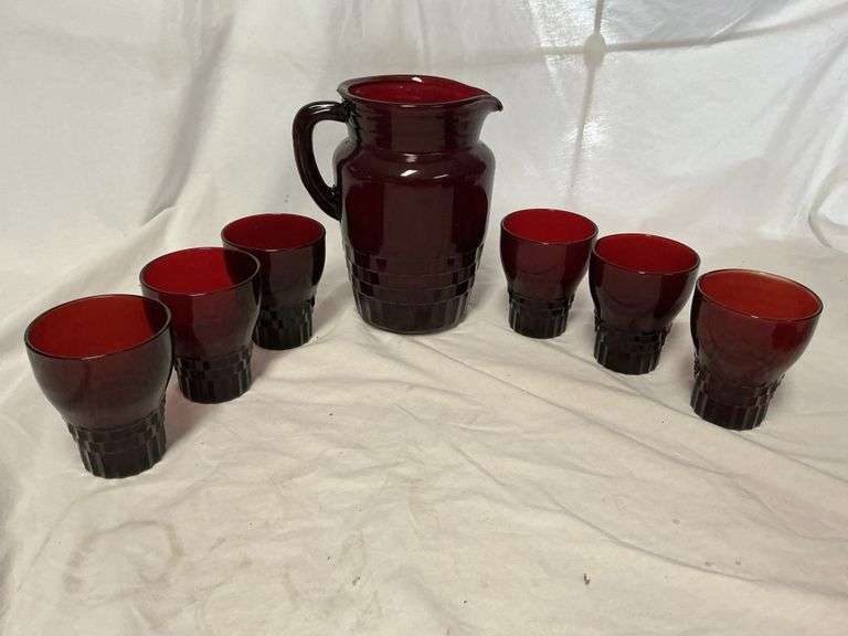 Ruby red pitcher and glasses - Legacy Auction Company