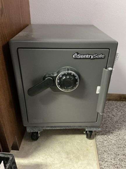 Sentry safe with combination & dolly - Legacy Auction Company