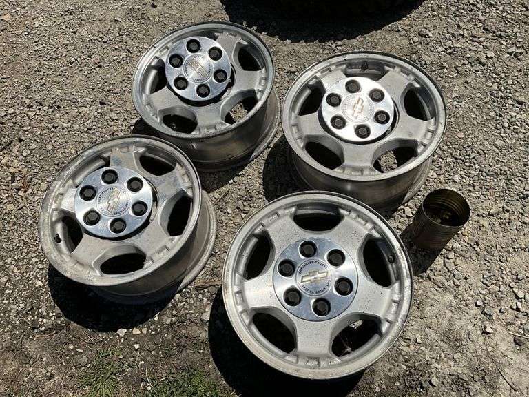 2001 Chevy pickup rims 16" w/ lug nuts. - Legacy Auction Company