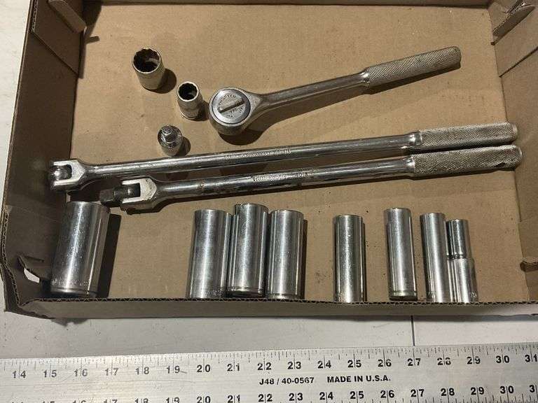 1/2" assorted Deep well sockets, breaker bars - Legacy Auction Company