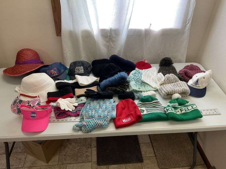 Assorted stocking hats, some with advertising, - Legacy Auction Company