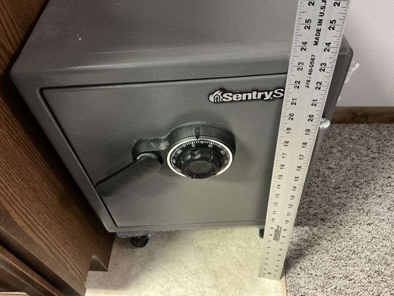 Sentry safe with combination & dolly - Legacy Auction Company