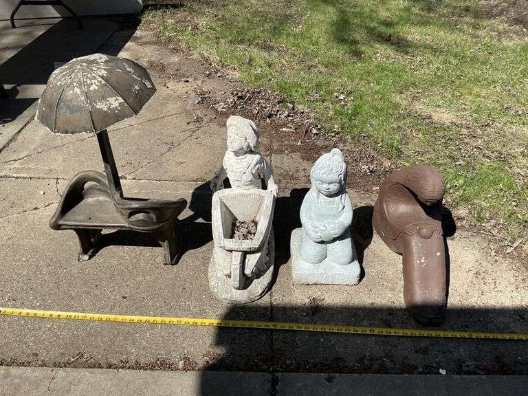 Cement figures - Legacy Auction Company