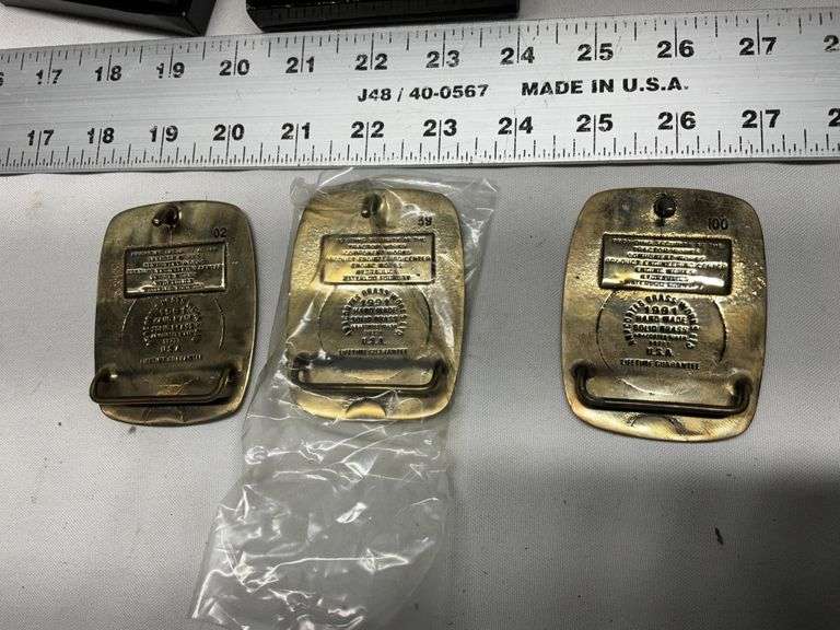 John Deere security belt buckles - Legacy Auction Company