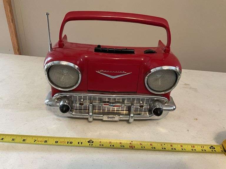 57 Chevy radio - Legacy Auction Company