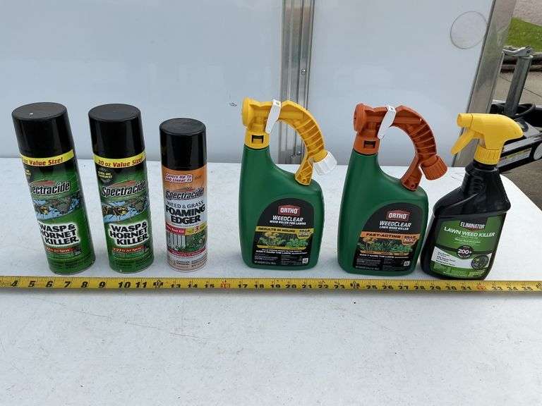 Full containers of weed killer and wasp killer - Legacy Auction Company