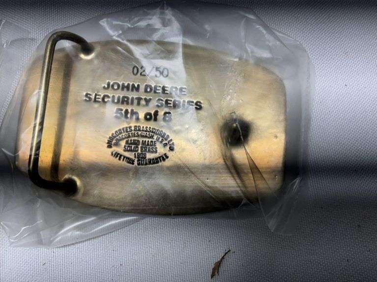John Deere security belt buckles - Legacy Auction Company