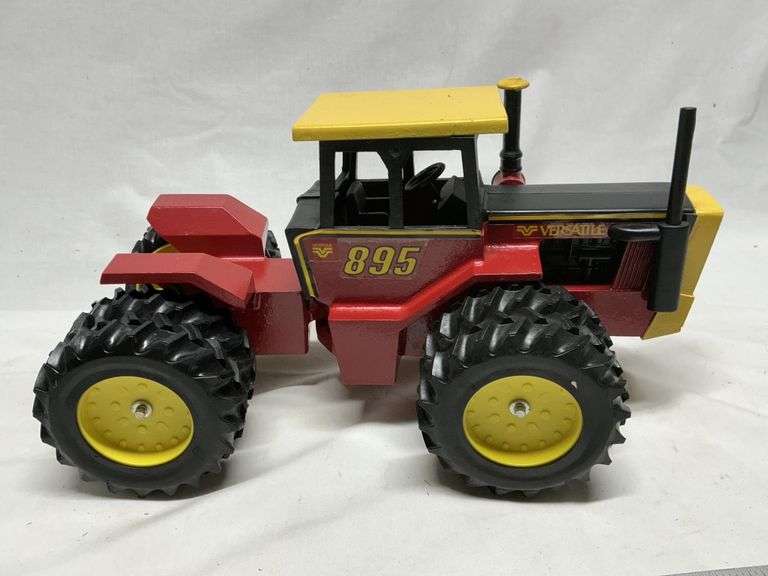 Versatile 895 4WD drive tractor - Legacy Auction Company