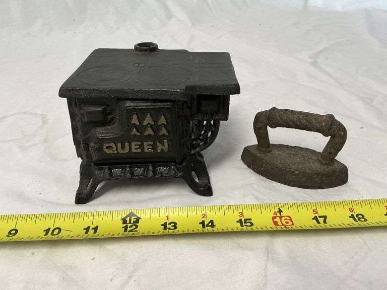 Cast iron stove music box, iron - Legacy Auction Company