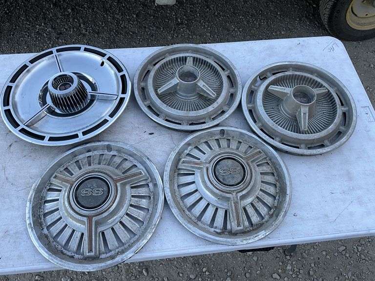 5 SS hubcaps - Legacy Auction Company