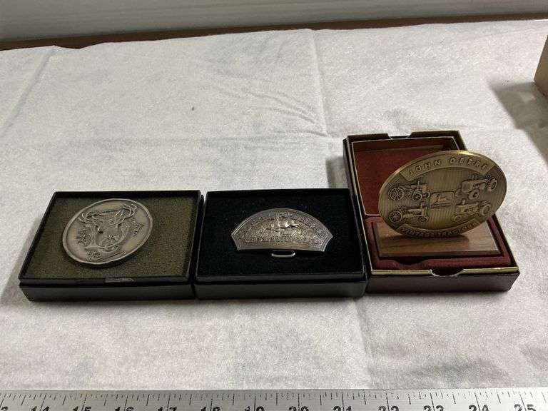 John Deere belt buckles and medallion - Legacy Auction Company