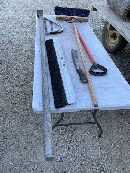 Cement broom, both saws, push broom, corn, knife, - Legacy Auction Company