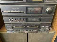 Realistic stereo system with speakers. CD player - Legacy Auction Company