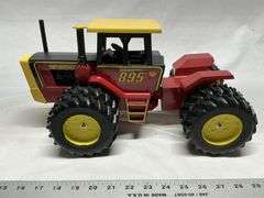 Versatile 895 4WD drive tractor - Legacy Auction Company