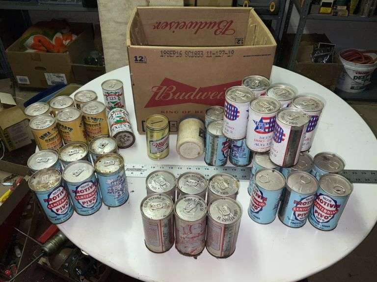 Assorted beer cans - Legacy Auction Company