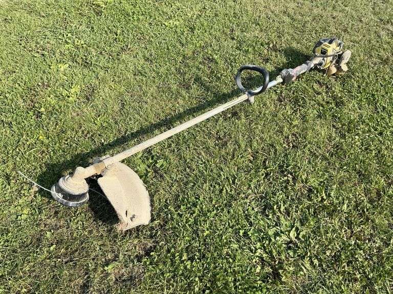 John Deere 105S string trimmer - Legacy Auction Company