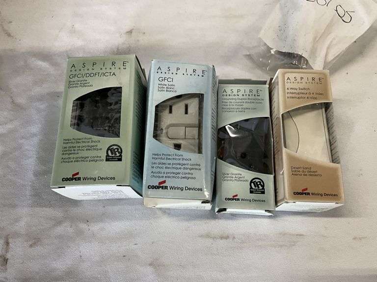 Box of assorted light switches, and grounding - Legacy Auction Company