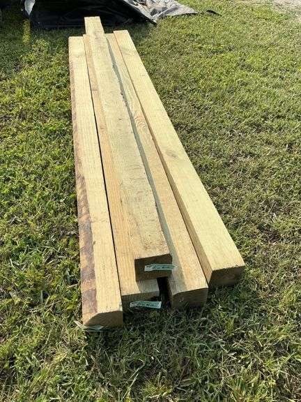 4" x 4" x 6' treated posts - Legacy Auction Company