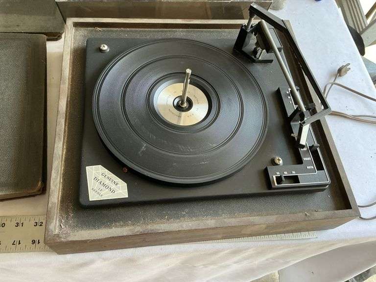 Records, record player (works) - Legacy Auction Company