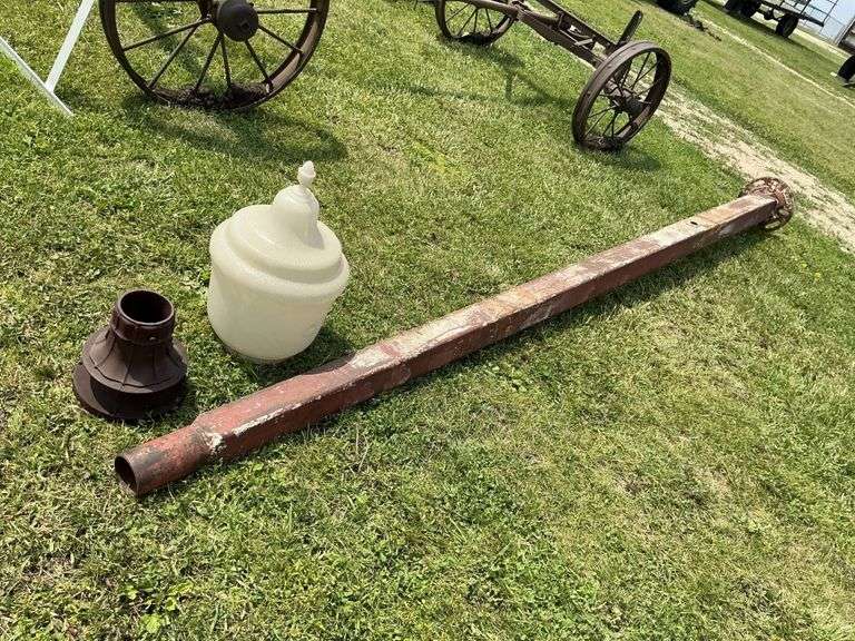 Vintage light pole with globe and top casting, - Legacy Auction Company