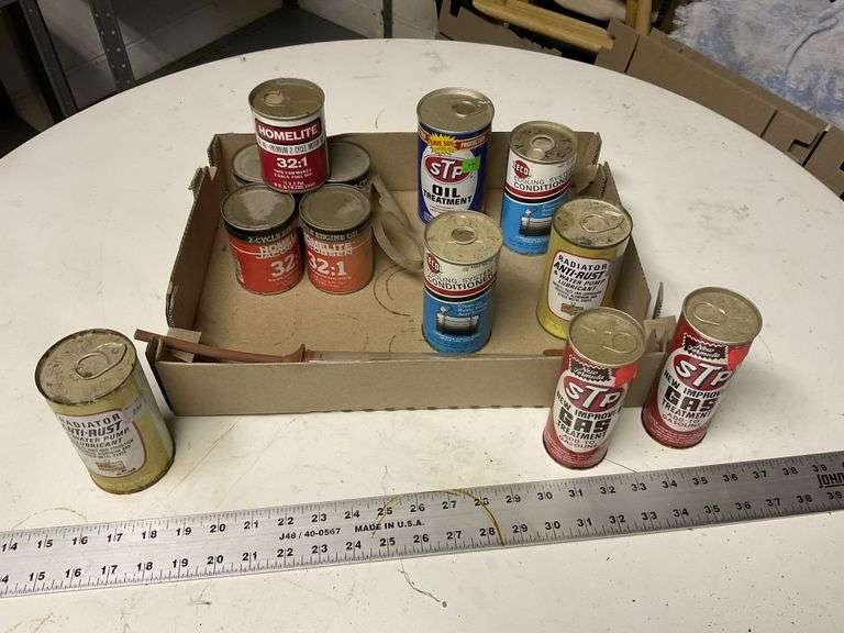 Vintage automotive fluid cans with fluid - Legacy Auction Company