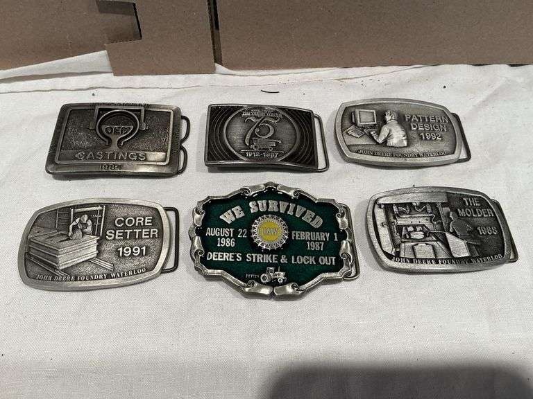 John Deere belt buckles - Legacy Auction Company