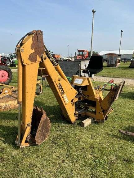 Woods 1050 three-point backhoe - Legacy Auction Company